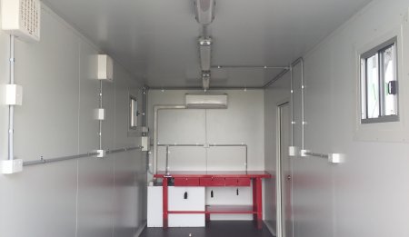 Shipping Container Modifications: Shelving, Power, Air-con & more